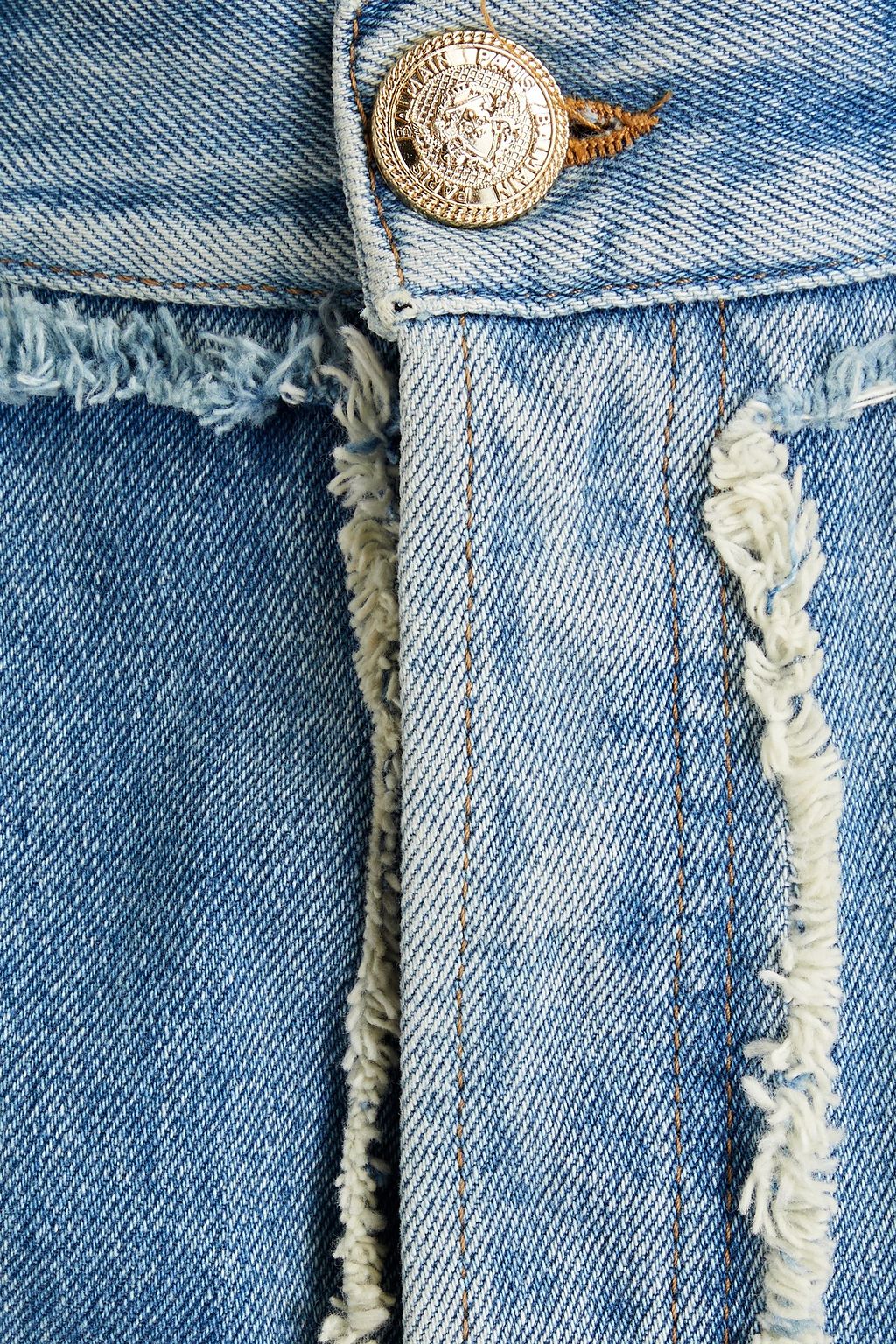 BALMAIN Distressed faded high-rise tapered jeans | THE OUTNET