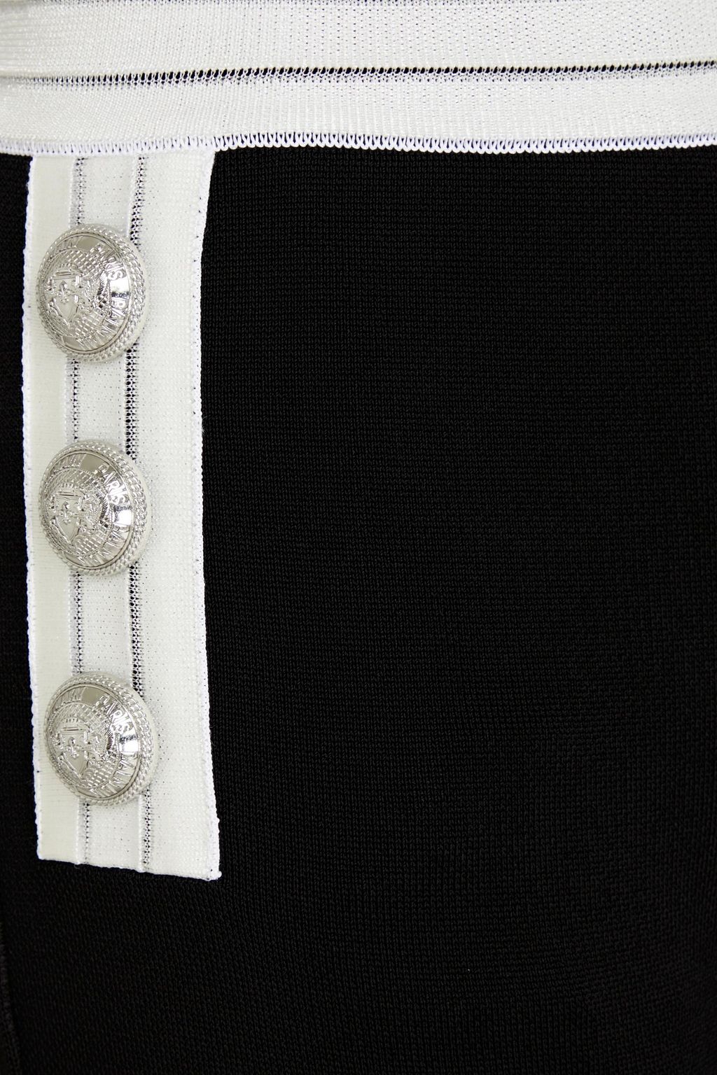 BALMAIN Button-embellished two-tone knitted kick-flare pants | THE OUTNET