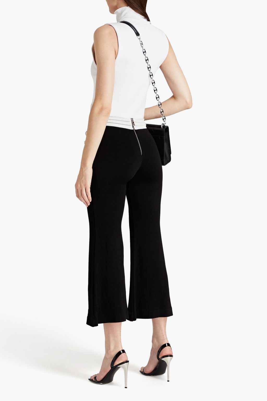 BALMAIN Button-embellished two-tone knitted kick-flare pants | THE OUTNET