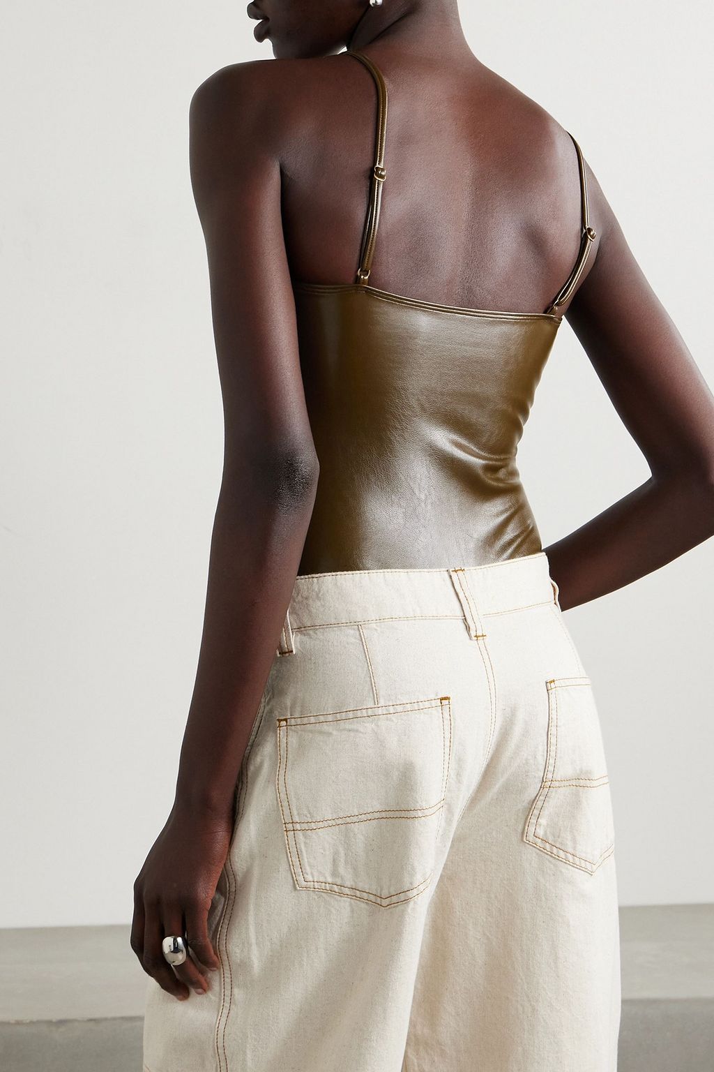 COMMANDO Faux stretch-leather bodysuit | THE OUTNET