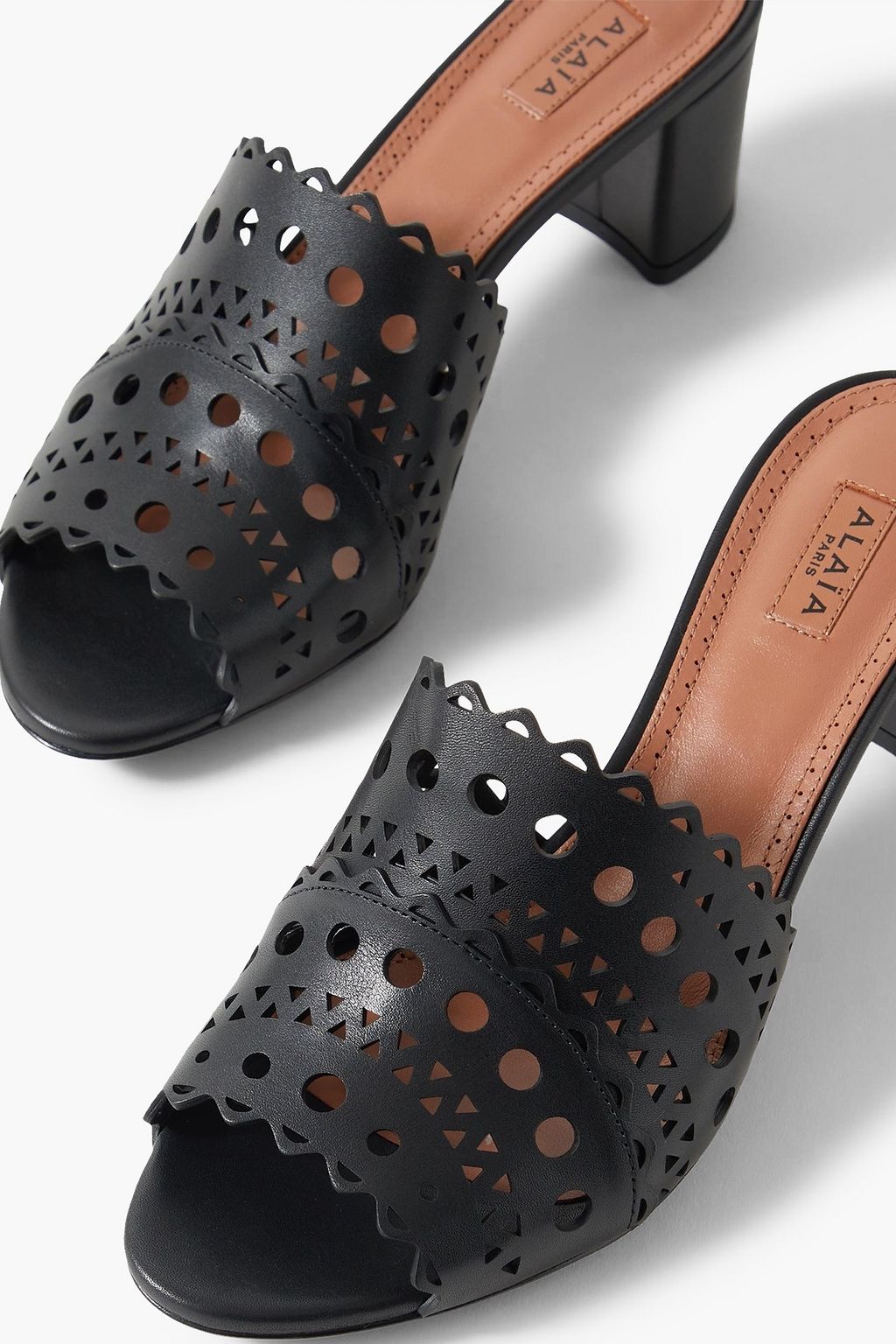 ALAÏA 60 laser-cut leather mules | THE OUTNET