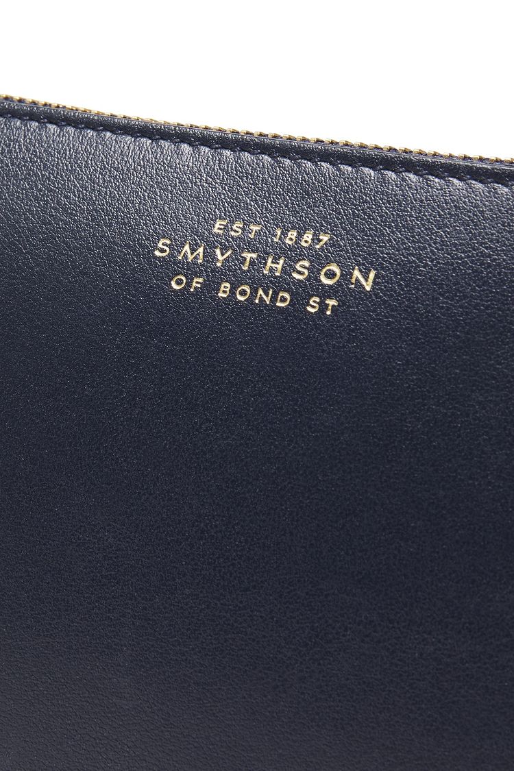 SMYTHSON Logo-appliquéd pebbled-leather pouch | THE OUTNET