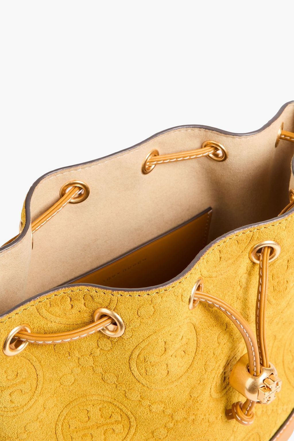 TORY BURCH T Monogram embossed suede bucket bag | THE OUTNET