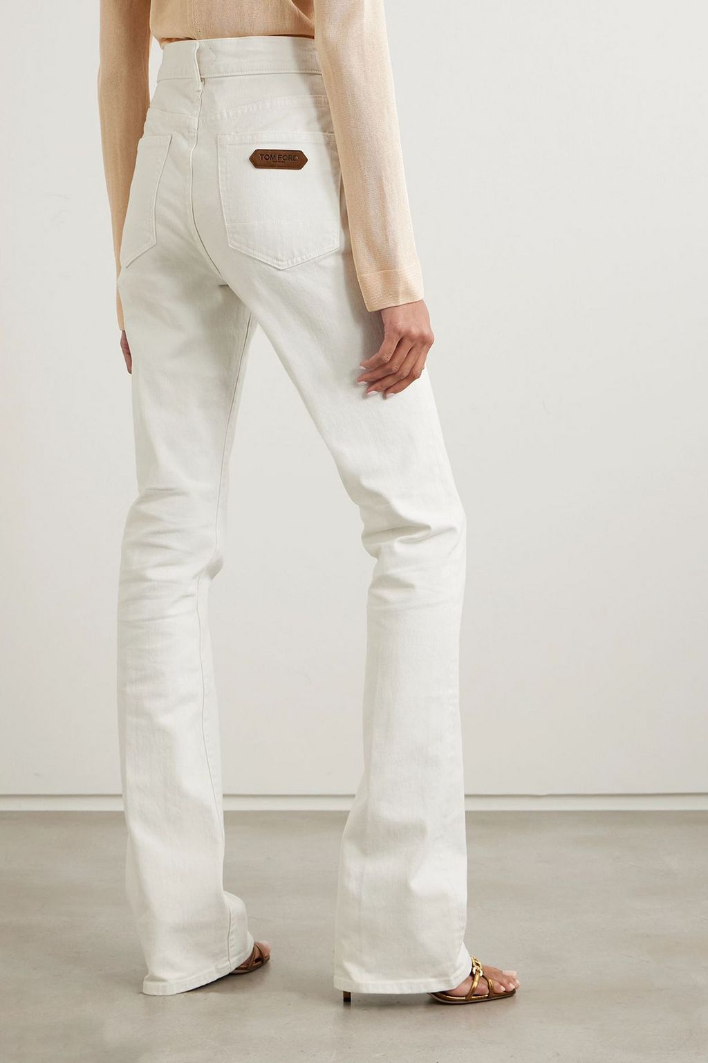TOM FORD Chain-embellished high-rise flared jeans | THE OUTNET